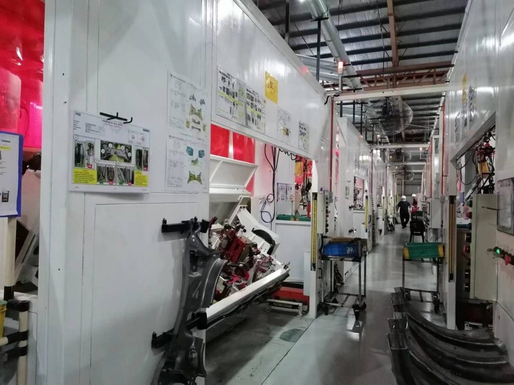 FRONT AXIAL REAR AXIAL MIG ROBOT WELDING LINE INSTALLATION AT TANJONG ...